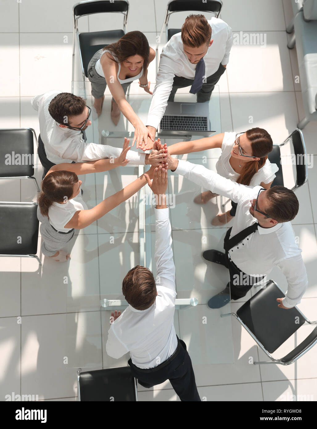 top view.employees of the company showing their unity Stock Photo - Alamy