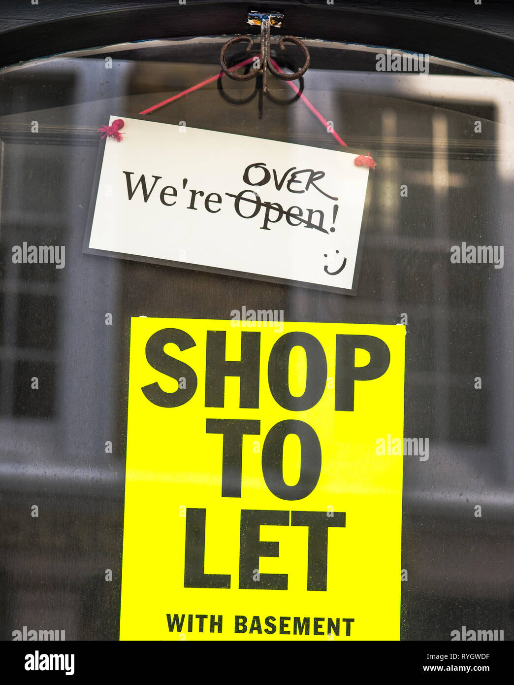 Signage on shop door announcing shop is closing and premises are for ...