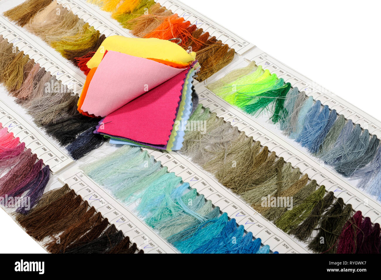 thread sample color card and fabric on white Stock Photo - Alamy