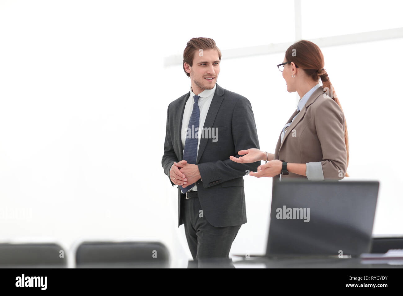 business colleagues talk in a modern office Stock Photo - Alamy