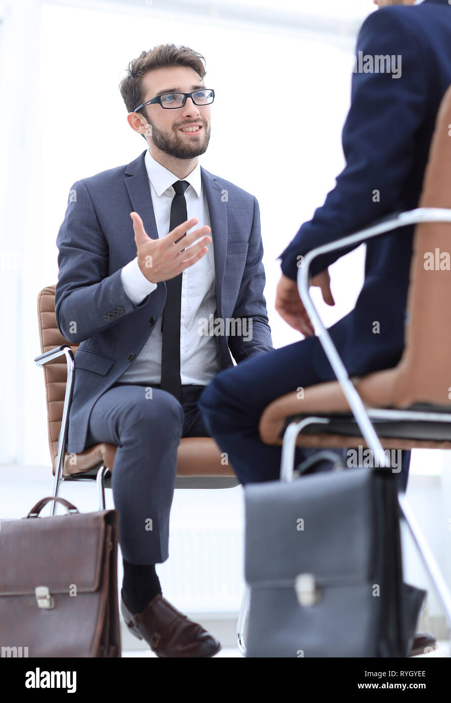 Two businessmen holding briefcases hi-res stock photography and images ...