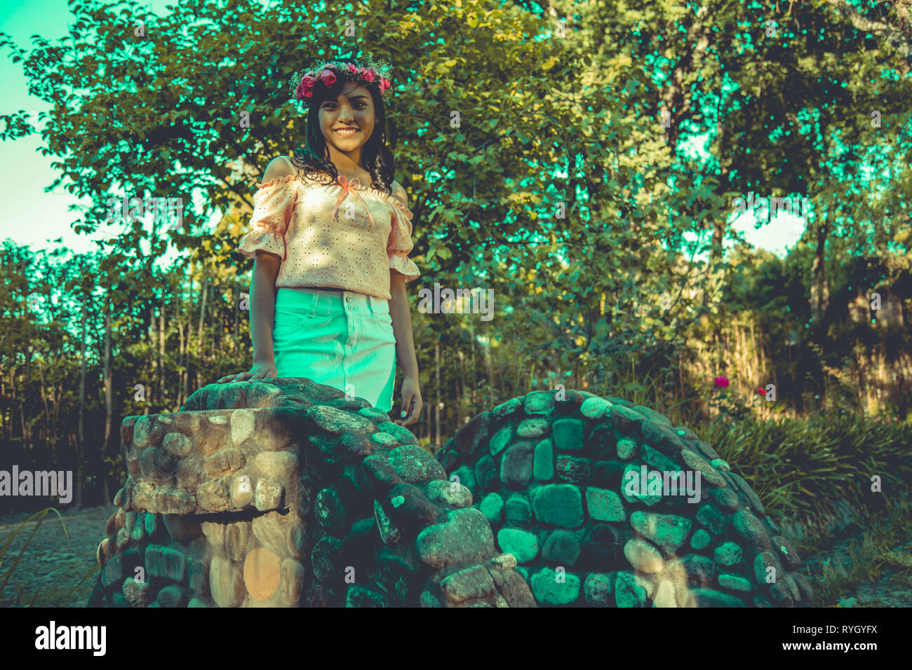 Girl stone flowers hi-res stock photography and images - Alamy