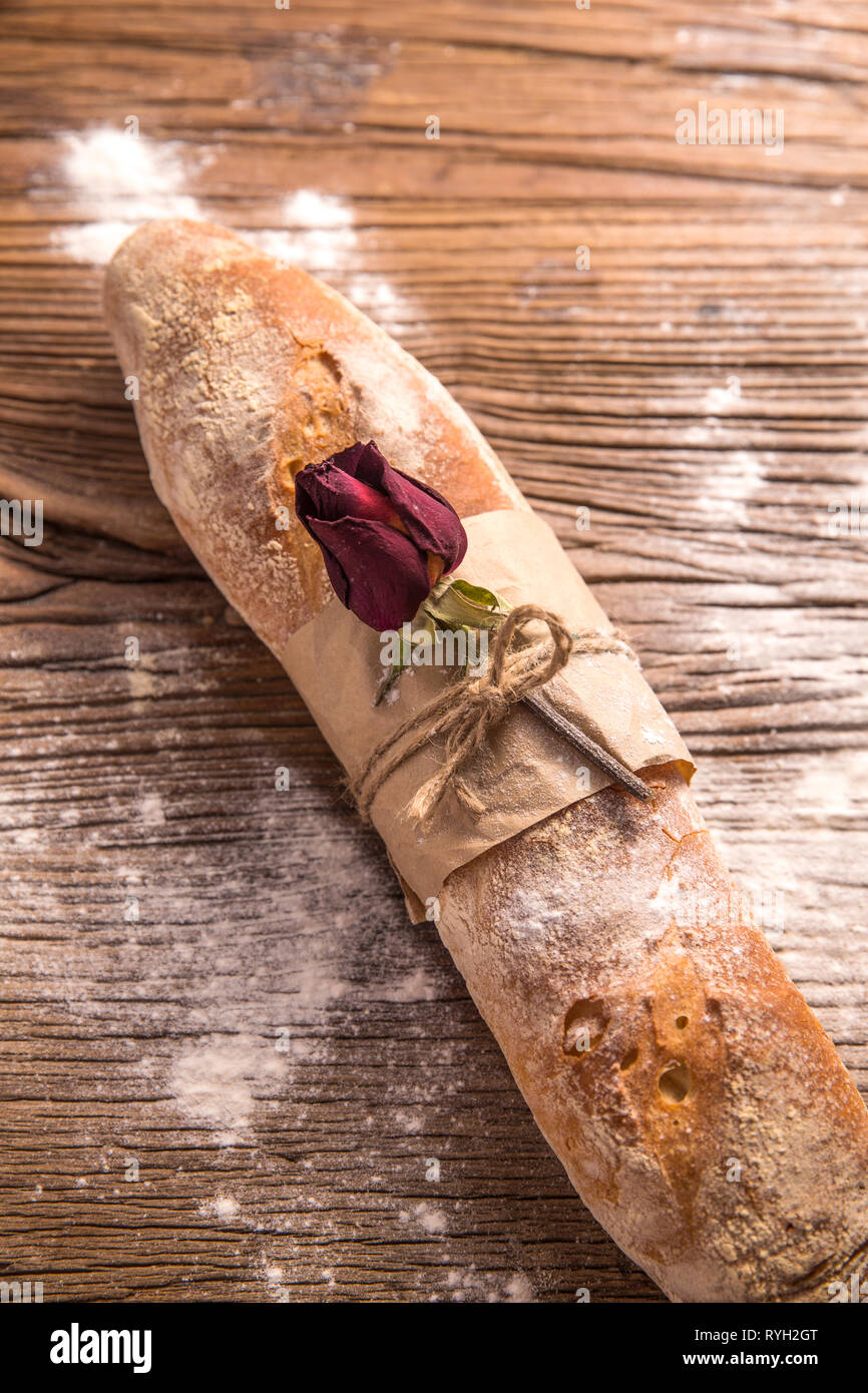 The roses and bread Stock Photo - Alamy