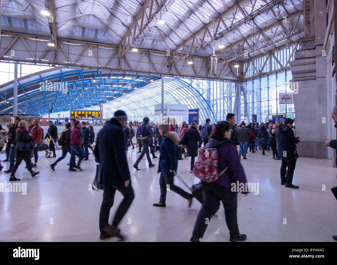 London Waterloo Station, London, England, March 12 2019. Commuters ...