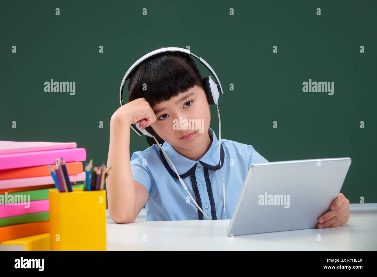 Primary school girls online learning Stock Photo - Alamy