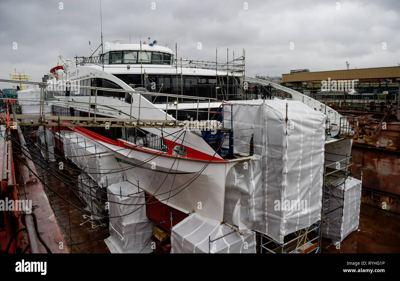 Hamburg, Germany. 13th Mar, 2019. The catamaran "Halunder Jet" lies in ...