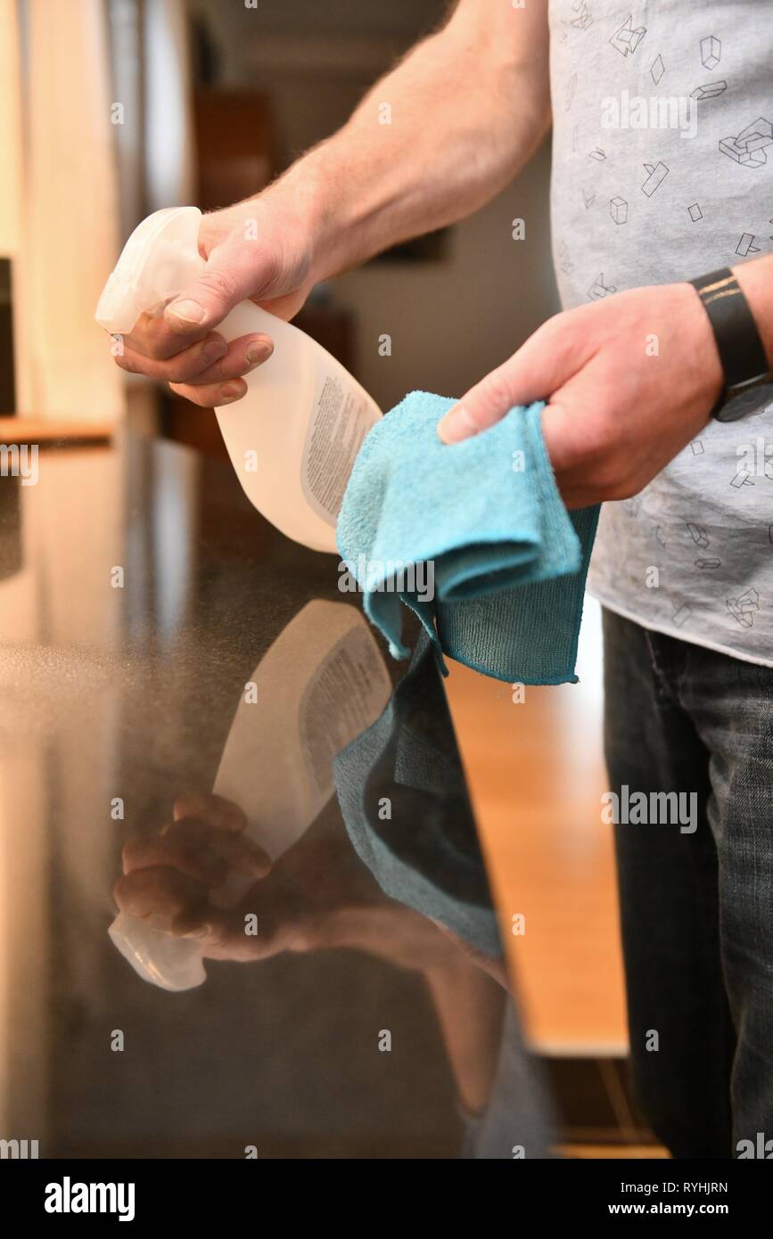 Bad Grund, Germany. 09th Mar, 2019. A man is doing household chore ...