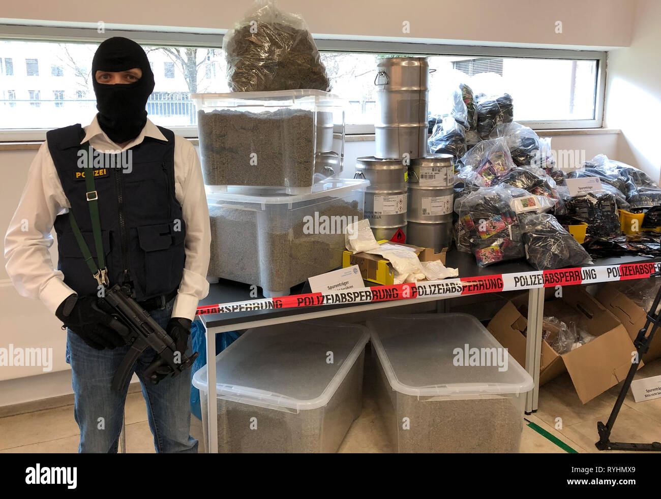 14 March 2019, Bavaria, München: An armed police officer stands in the ...