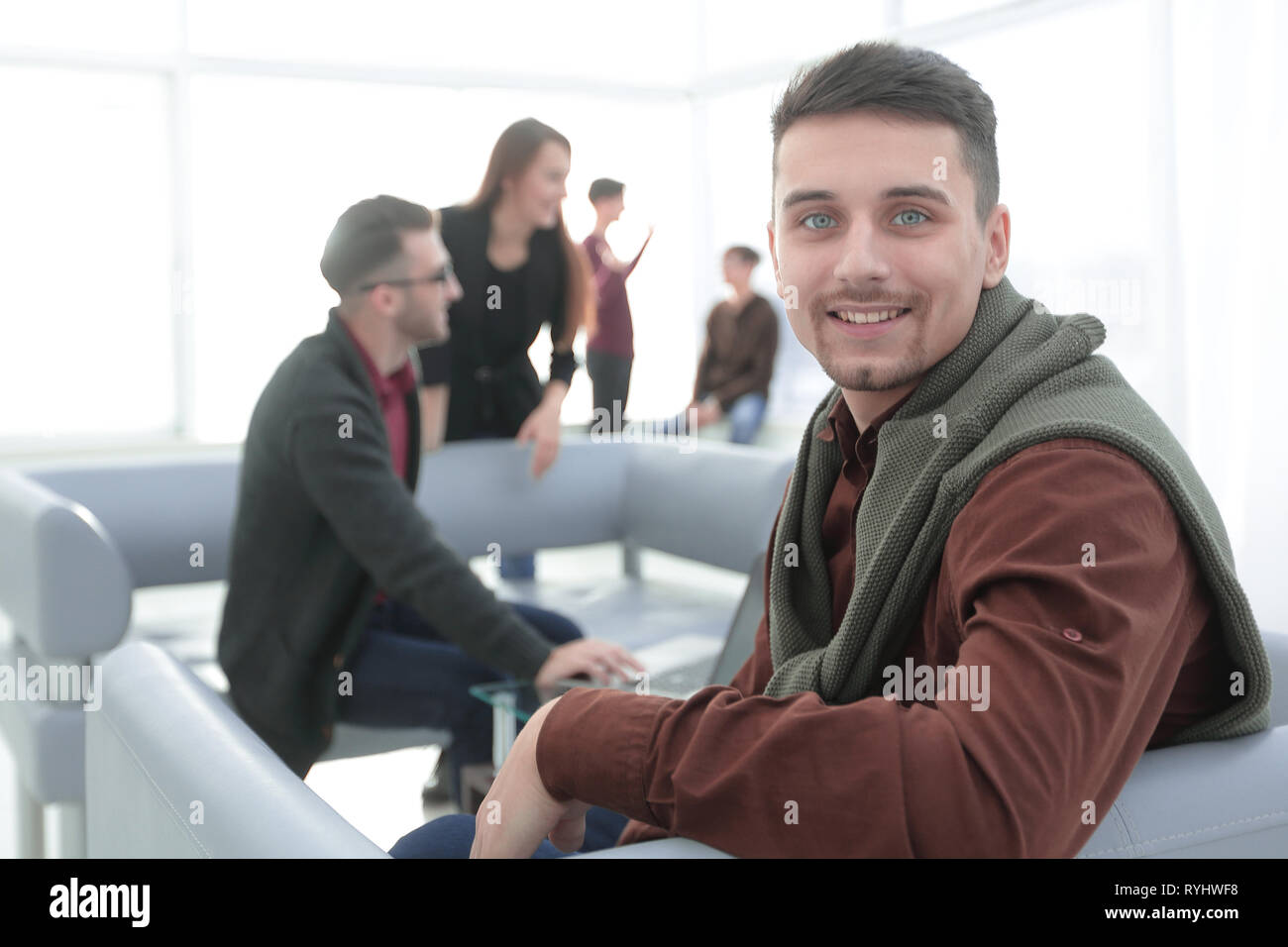 modern man in the background of the office Stock Photo - Alamy