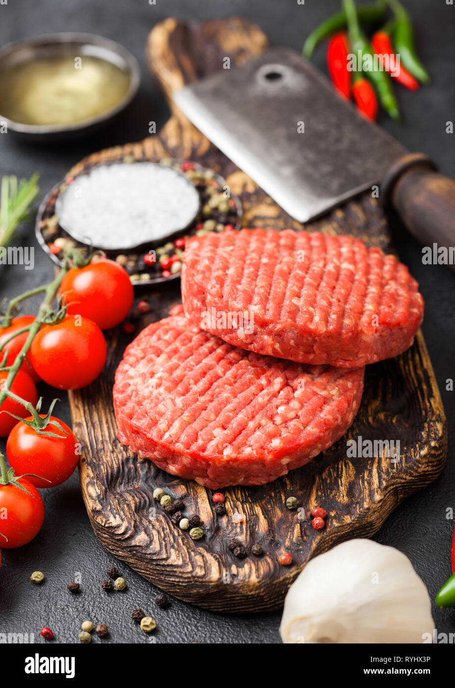Fresh raw minced homemade farmers grill beef burgers on vintage ...