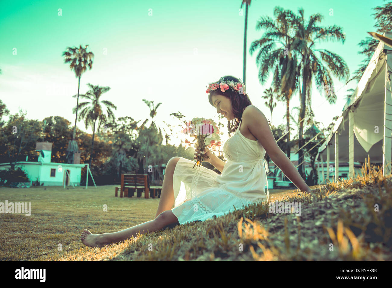 Girl modeling with flowers bouquet Stock Photo - Alamy