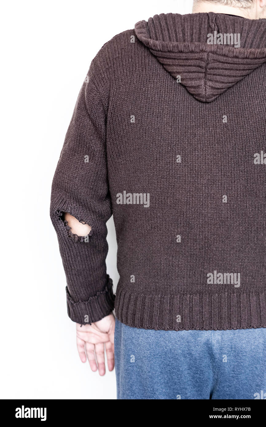 Man with worn to holes fabric sweater with pipped sleeve - Person ...