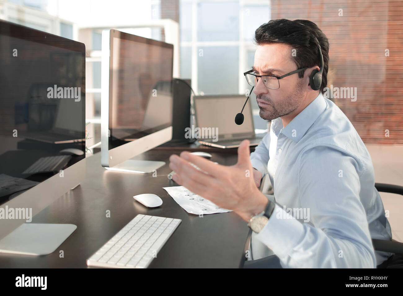 businessman analyzes the data sitting in the office Stock Photo - Alamy
