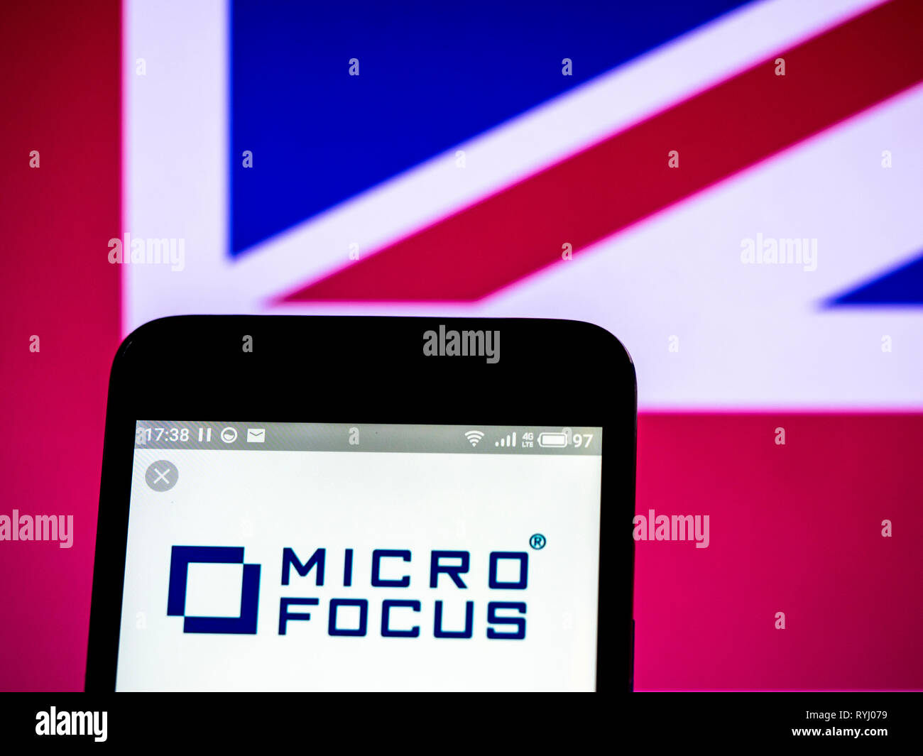 Micro Focus International plc company logo seen displayed on smart ...