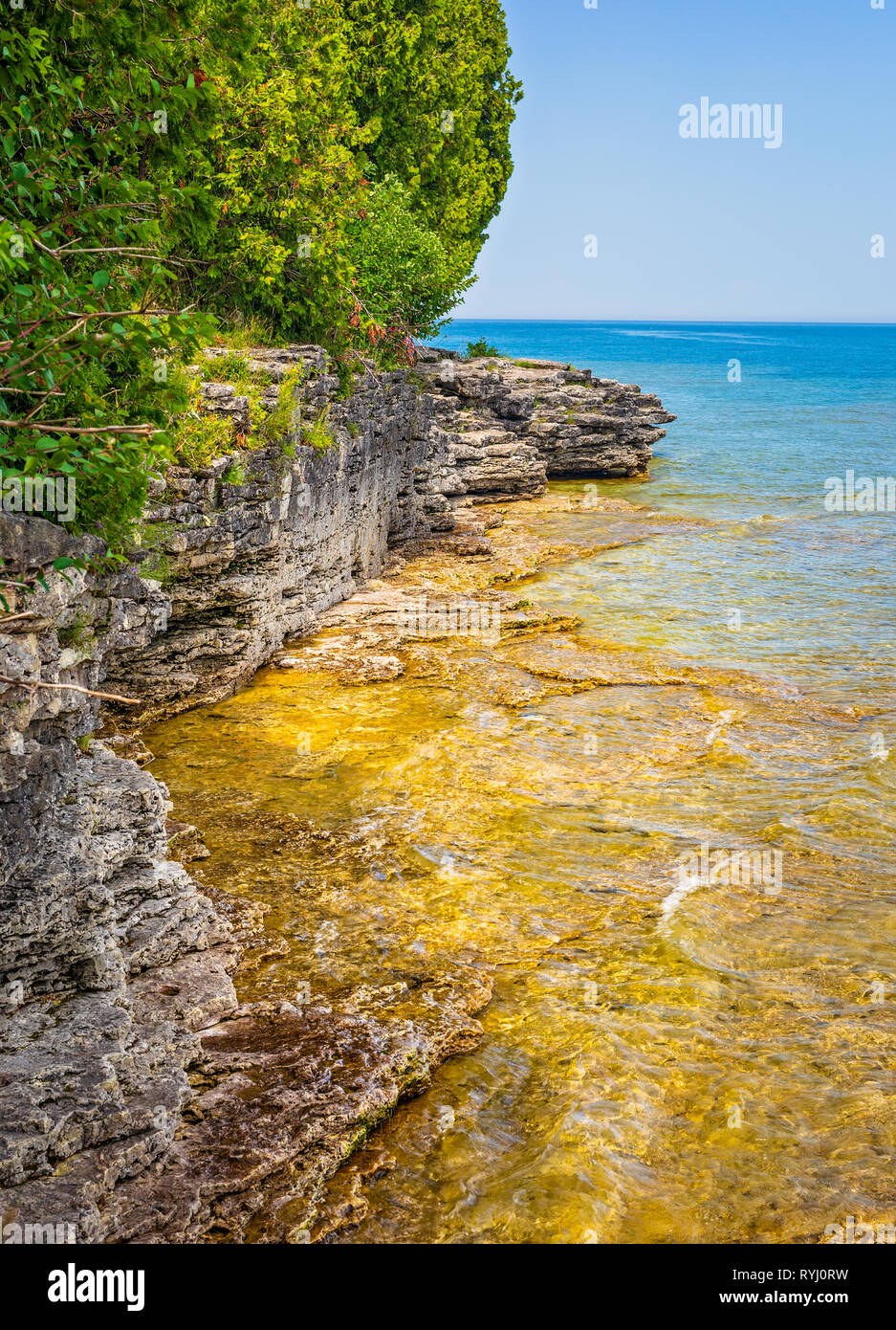 rocky cliff coastline at Door County, Wisconsin's Cave Point on the ...