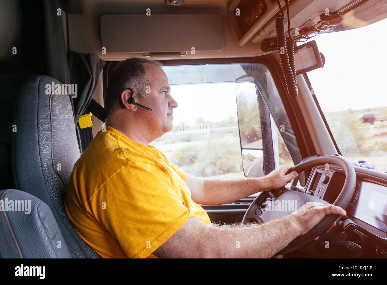 Man driving on a highway on the asphalt road in rural landscape Stock ...
