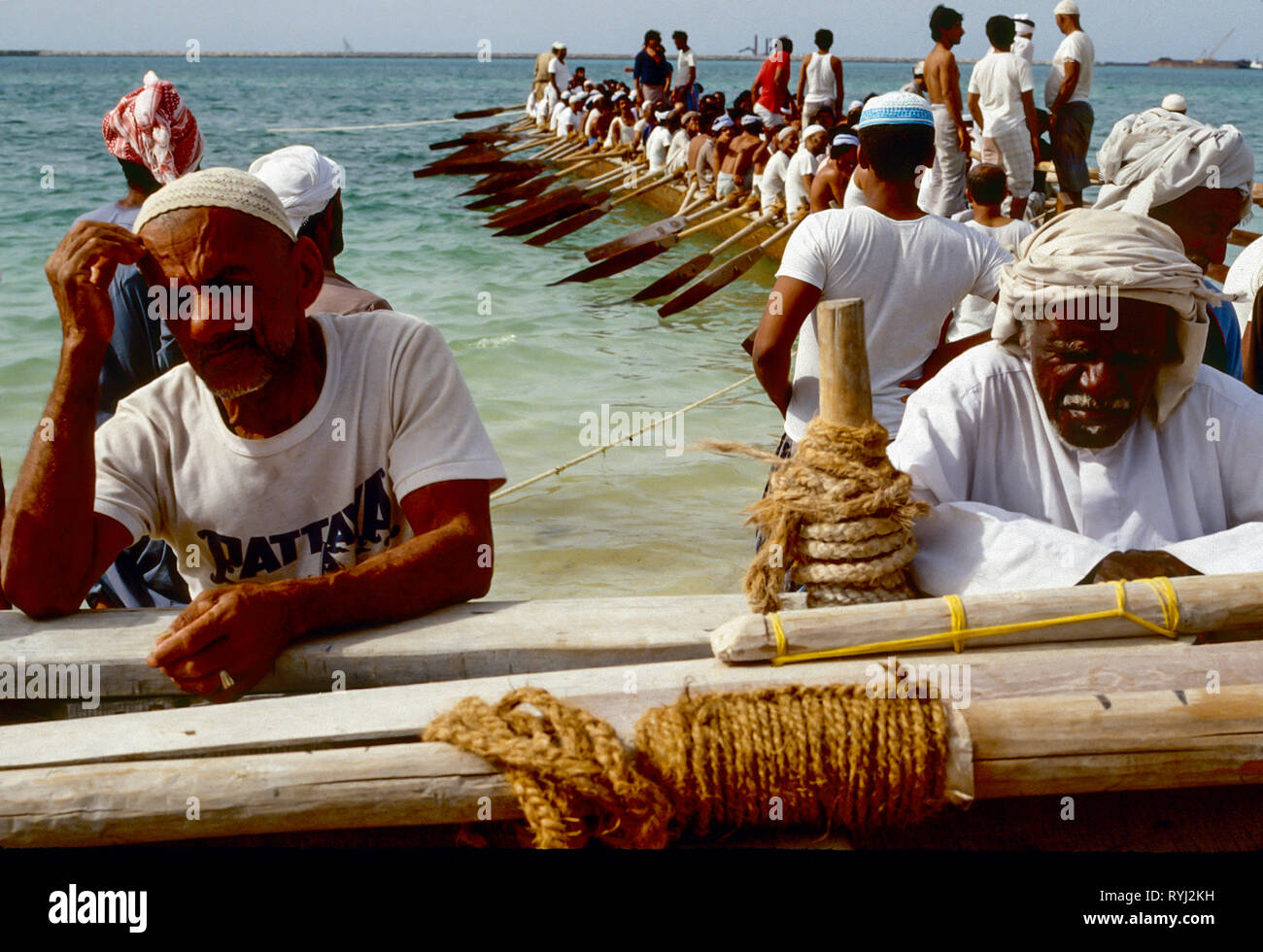 Dubai. Faces of Arabia with a group of tired looking men during one of ...