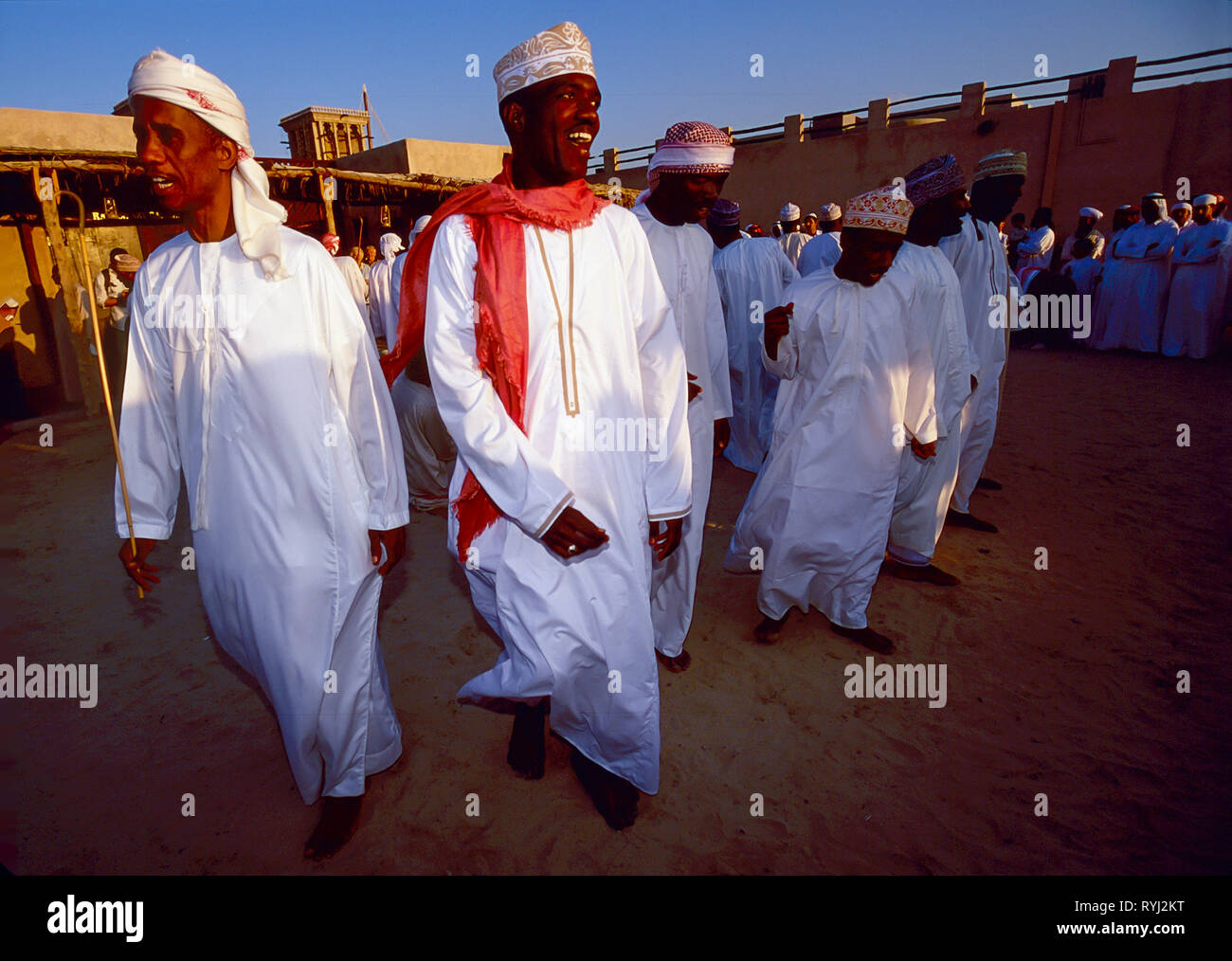Dubai. Faces of Arabia with a group of Omani men performing a tradition ...