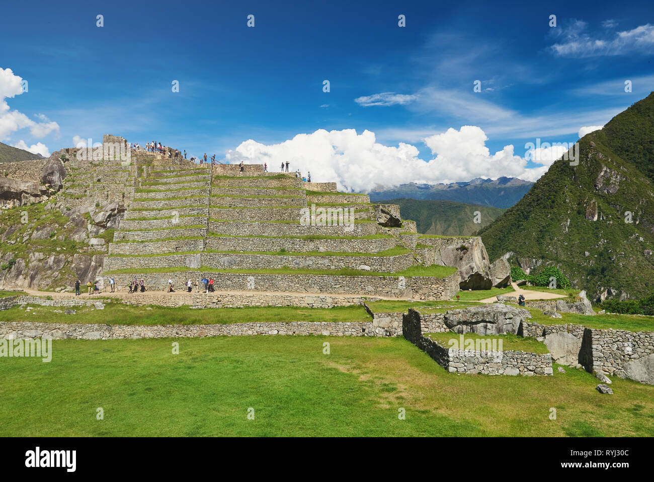 Machu Picchu, Peru - April 22, 2017: People walk in Machu Picchu ...