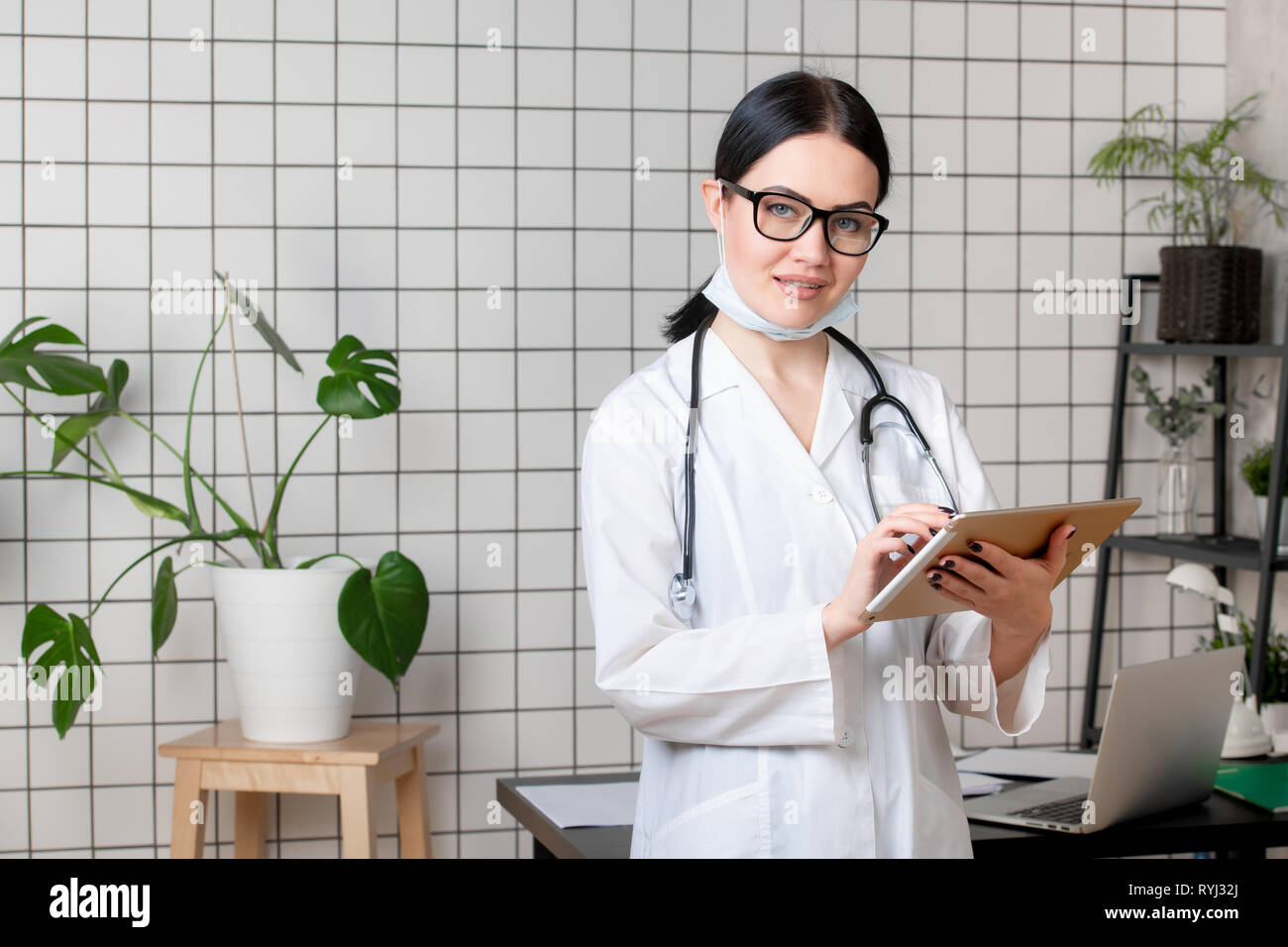 Female nurse isolated white scrubs pretty young caucasian hi-res stock ...