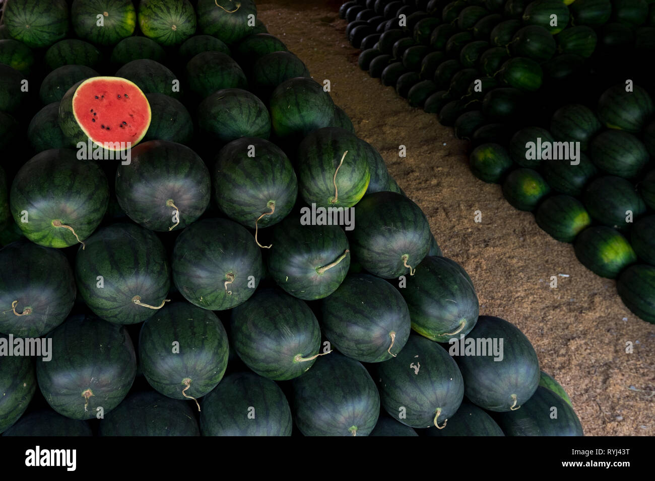 A fresh pile of watermelon is for sale at a wholesale market in Khon ...