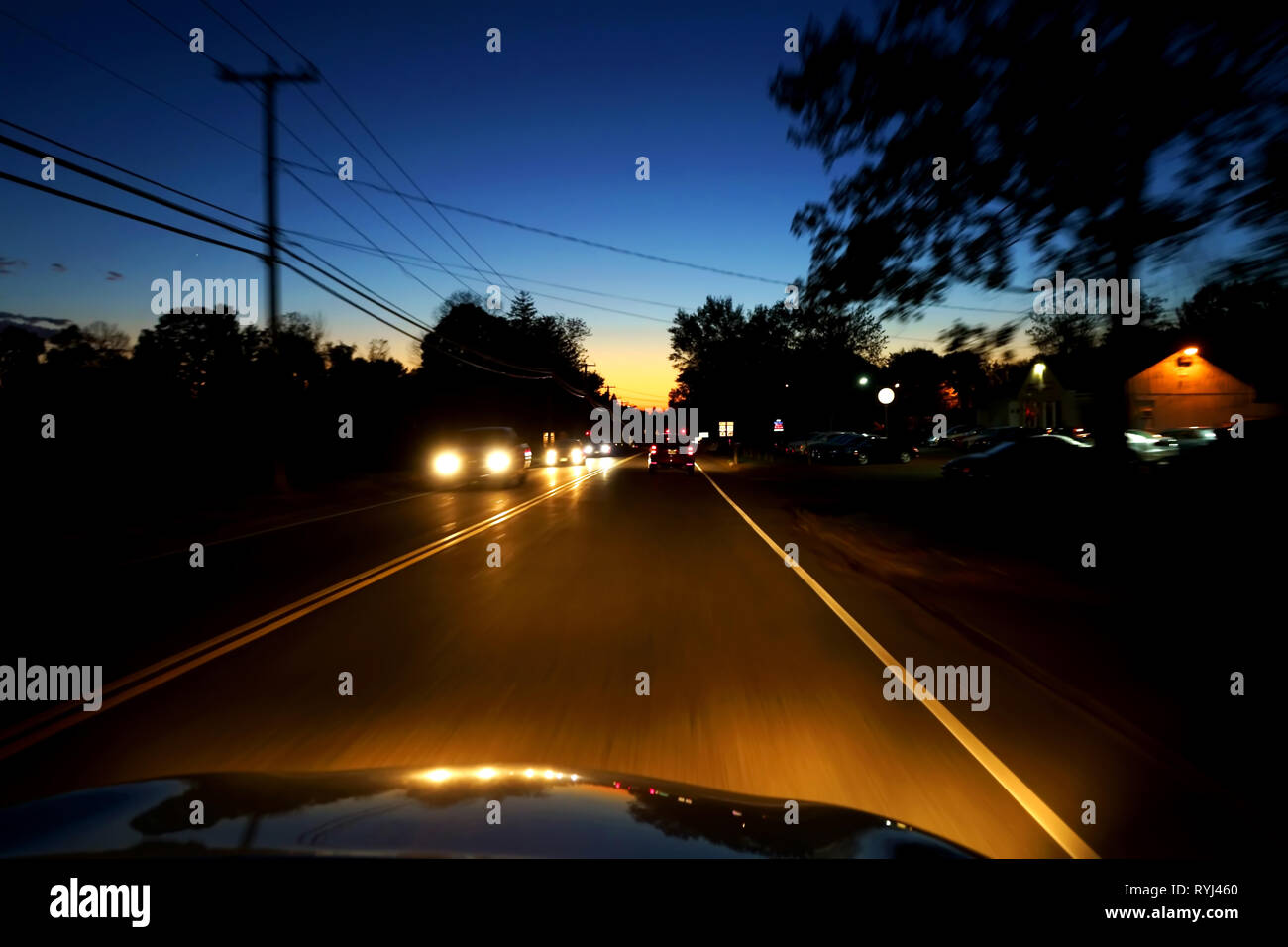 Night driving right after a sunset Stock Photo - Alamy