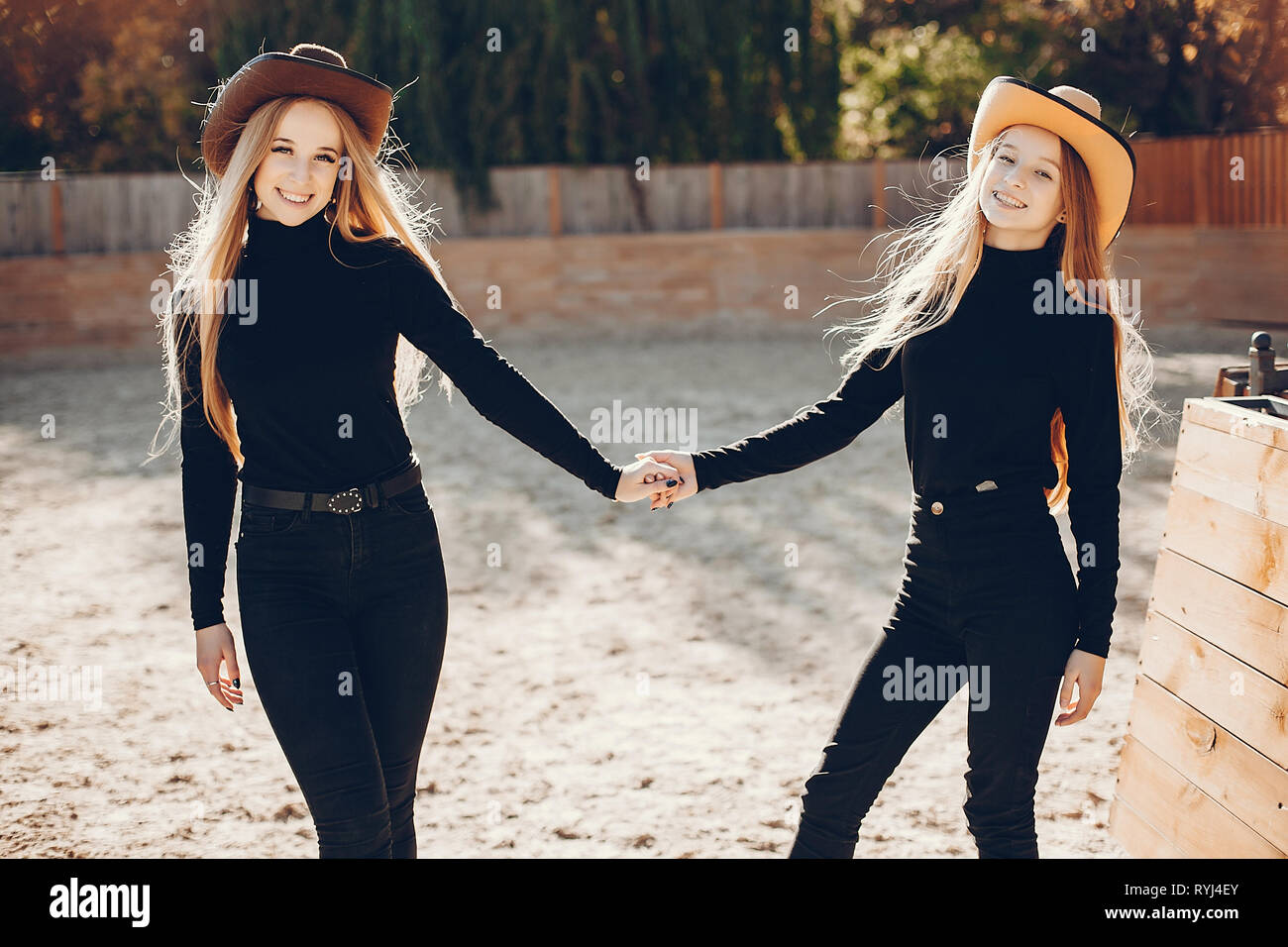 Girls in a cowboys hat on a ranch Stock Photo - Alamy