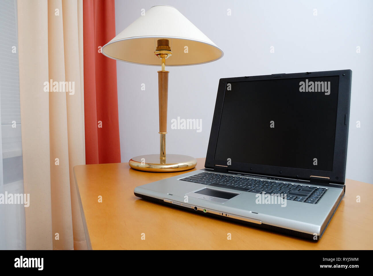 View of workplace in office. Laptop on desk Stock Photo - Alamy