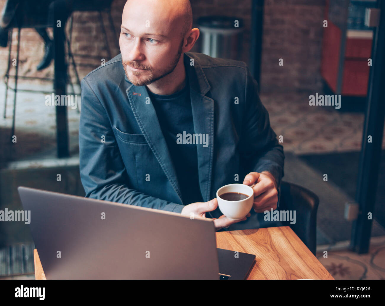 Thinking Attractive Adult Successful Bald Bearded Man In Suit With