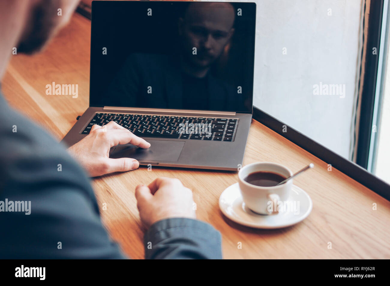 Adult Successful Bald Bearded Man In Suit With Laptop In Cafe Stock