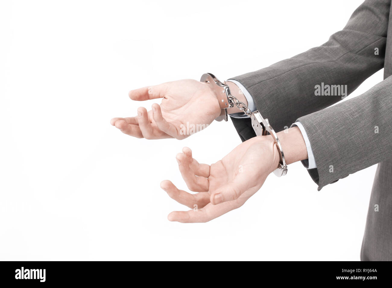 closeup. business men holding a handcuffs. isolated on white Stock ...