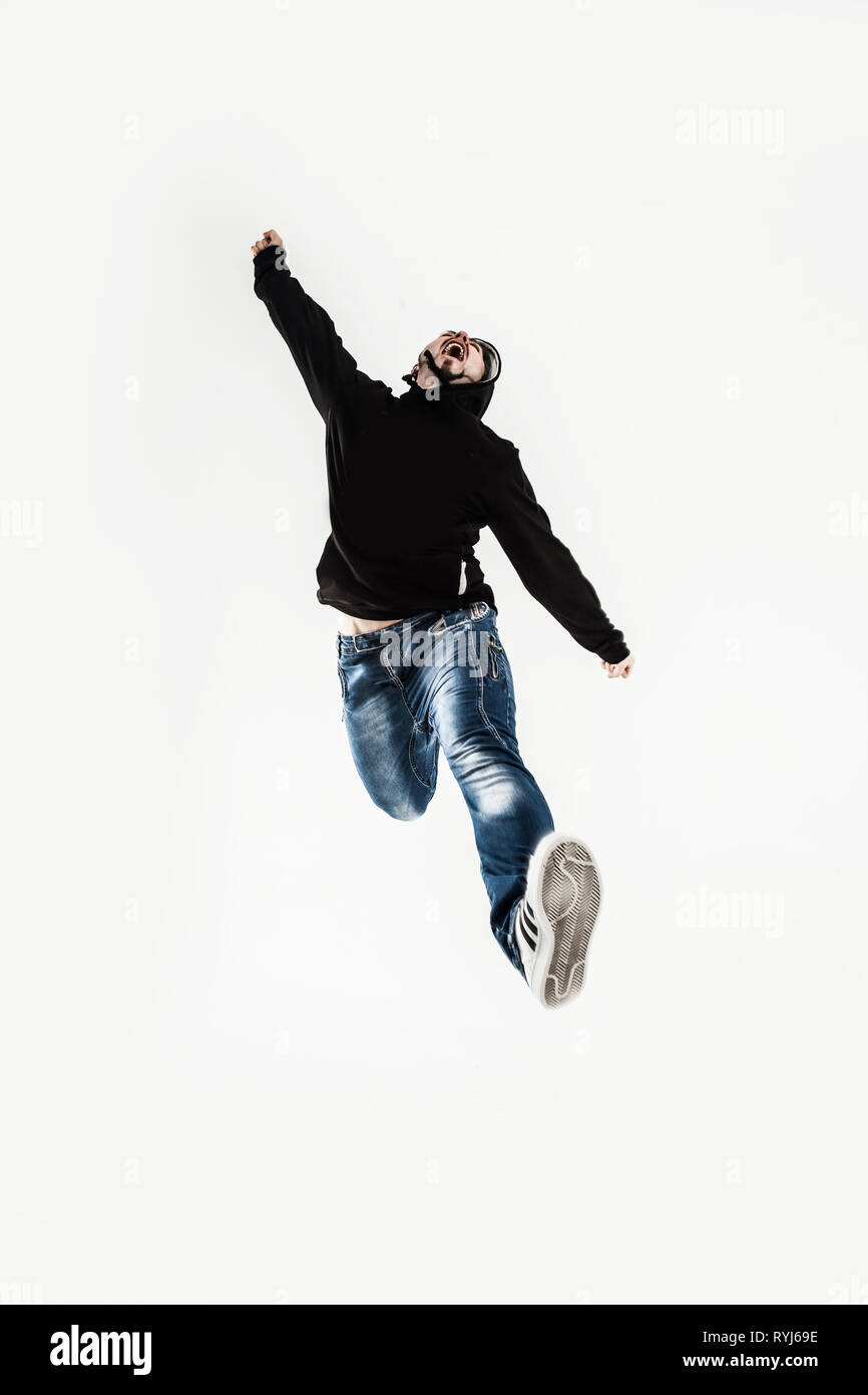 energetic and charismatic guy rapper dances break dance Stock Photo - Alamy