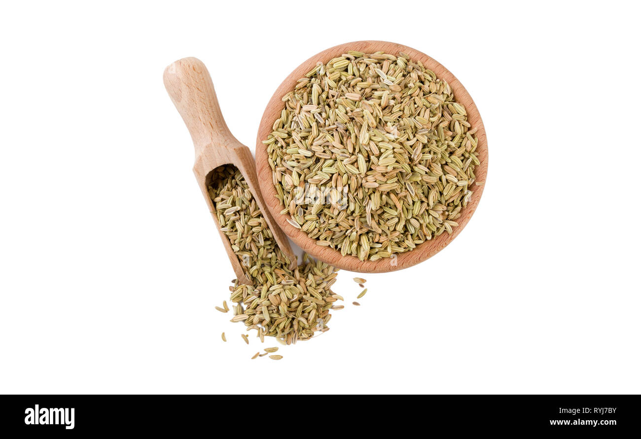 fennel seeds in wooden bowl and scoop isolated on white background. top ...
