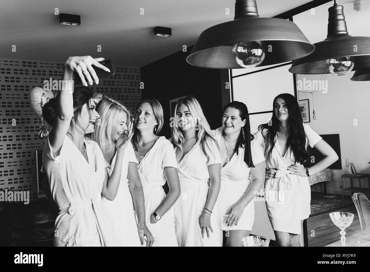 Girls party posing selfie Black and White Stock Photos & Images - Alamy