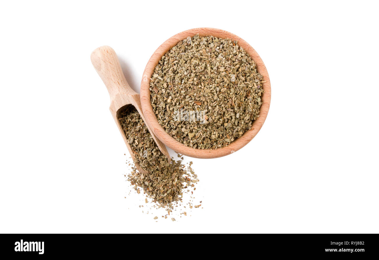 salvia or sage in wooden bowl and scoop isolated on white background ...