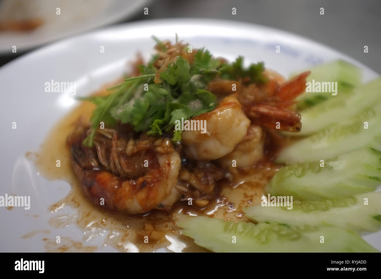 Shrimp with garlic pepper or Goong Tod Kra Thiam Phrik Thai Stock Photo ...