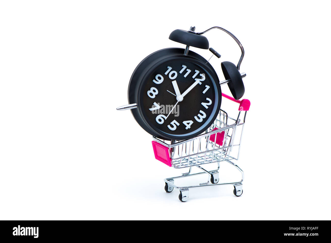 Black vintage alarm clock and shopping cart or supermarket trolley ...