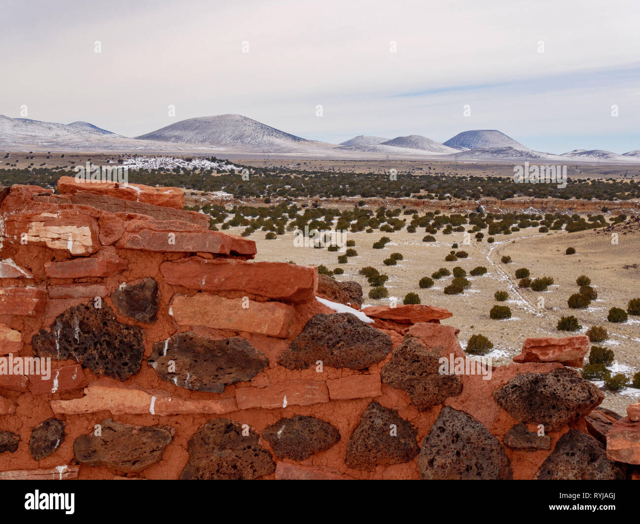Volcanic landscape and Citadel Ruin Wall. Wupatki National Monument ...