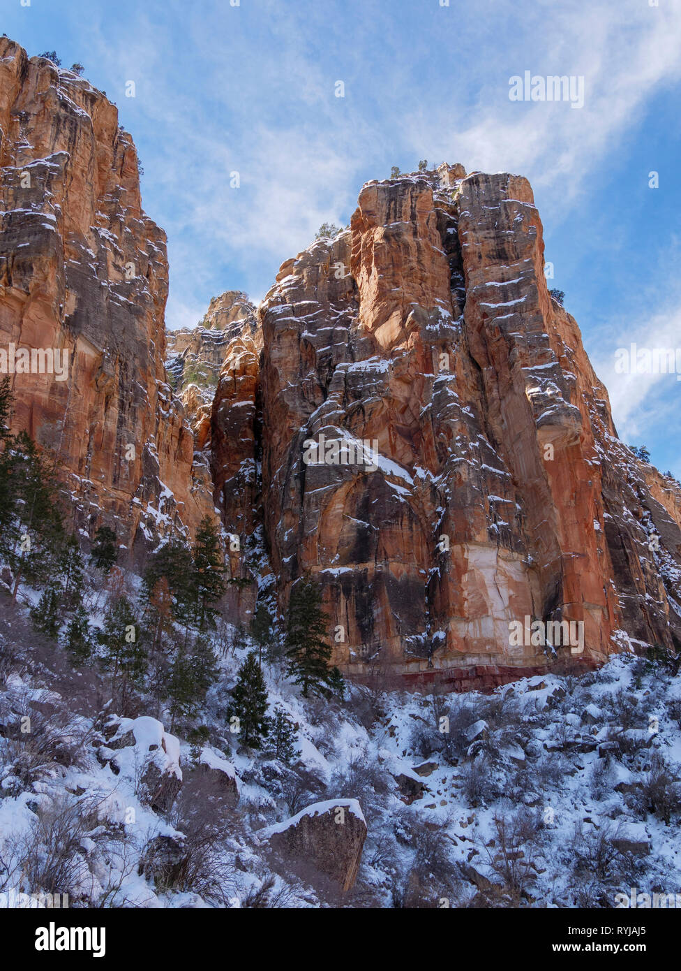 The towering canyon alls on the Bright Angel Trail. When the sun hit ...