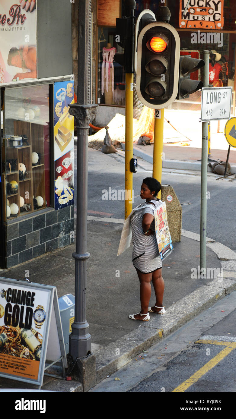 A walking advertisement for cash for gold Stock Photo - Alamy