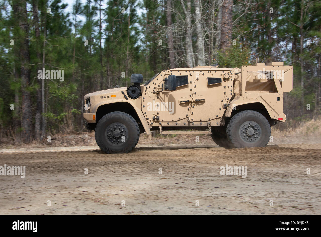 A Joint Light Tactical Vehicle drives along a tank trail during ...
