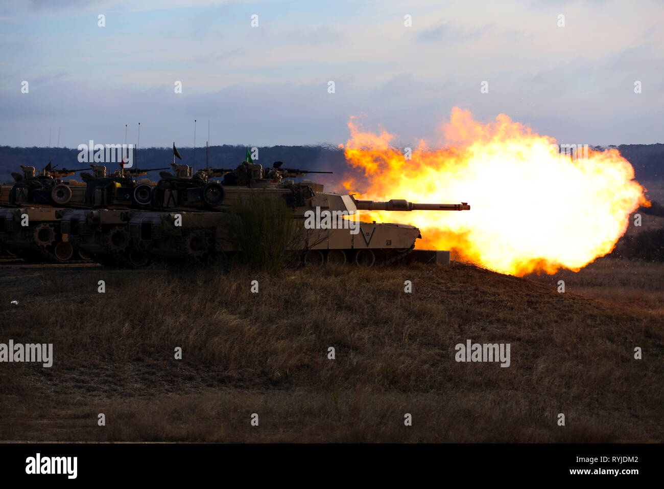U.S. Marines with 1st Tank Battalion, 1st Marine Division, fire a 120 ...