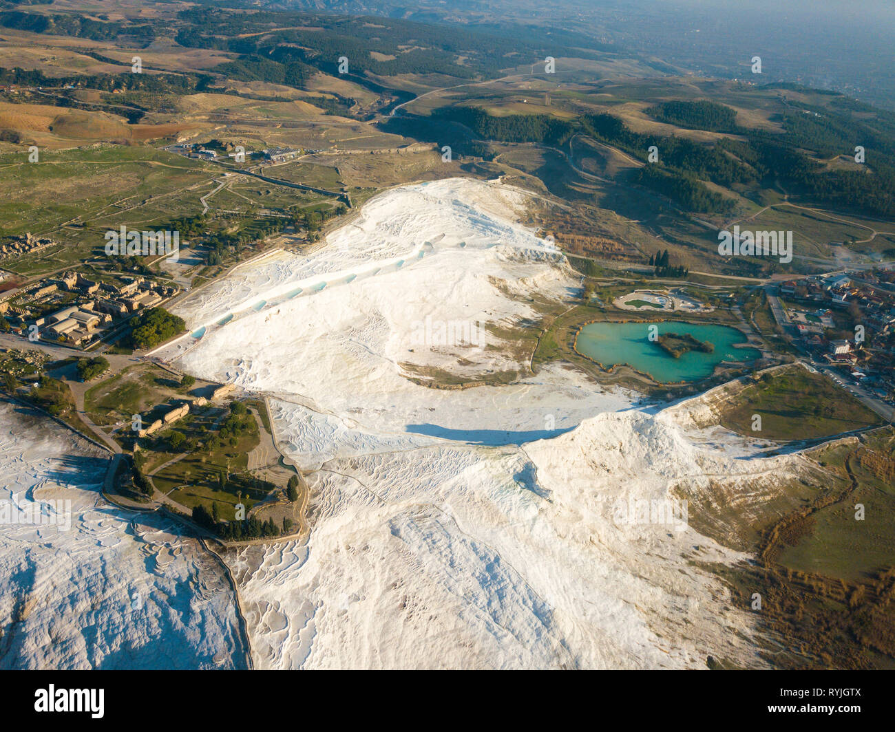 Aerial view of white cotton castle travertine terraces in Pamukkale ...