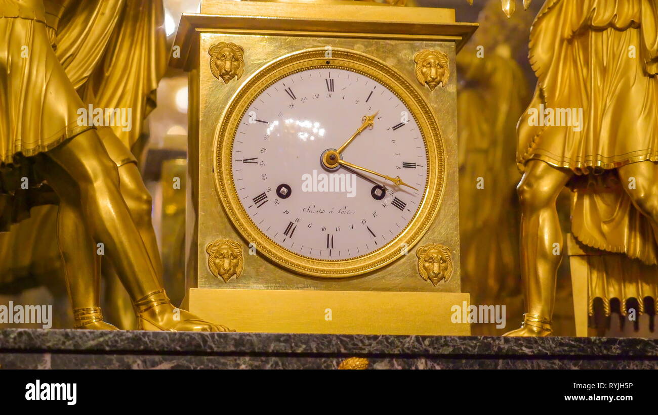 Closer look of the golden clock on the royal palace in Stockholm Sweden ...