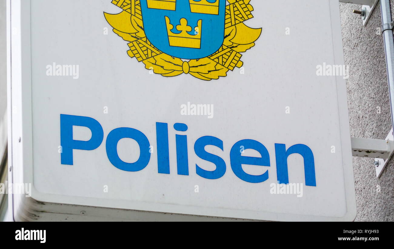 The police station signage outside the building with the logo of the ...