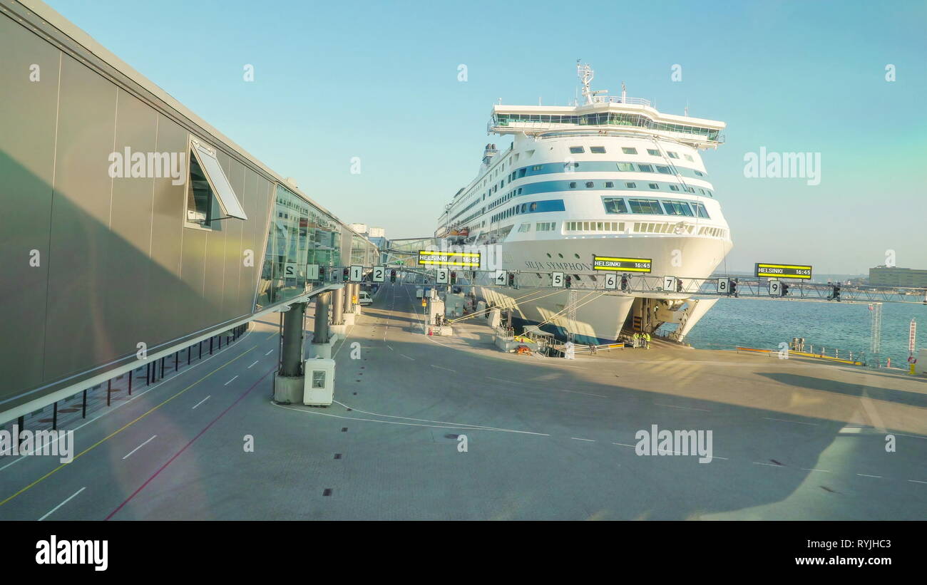 View of the big cruise ship while boarding passengers in the port area ...