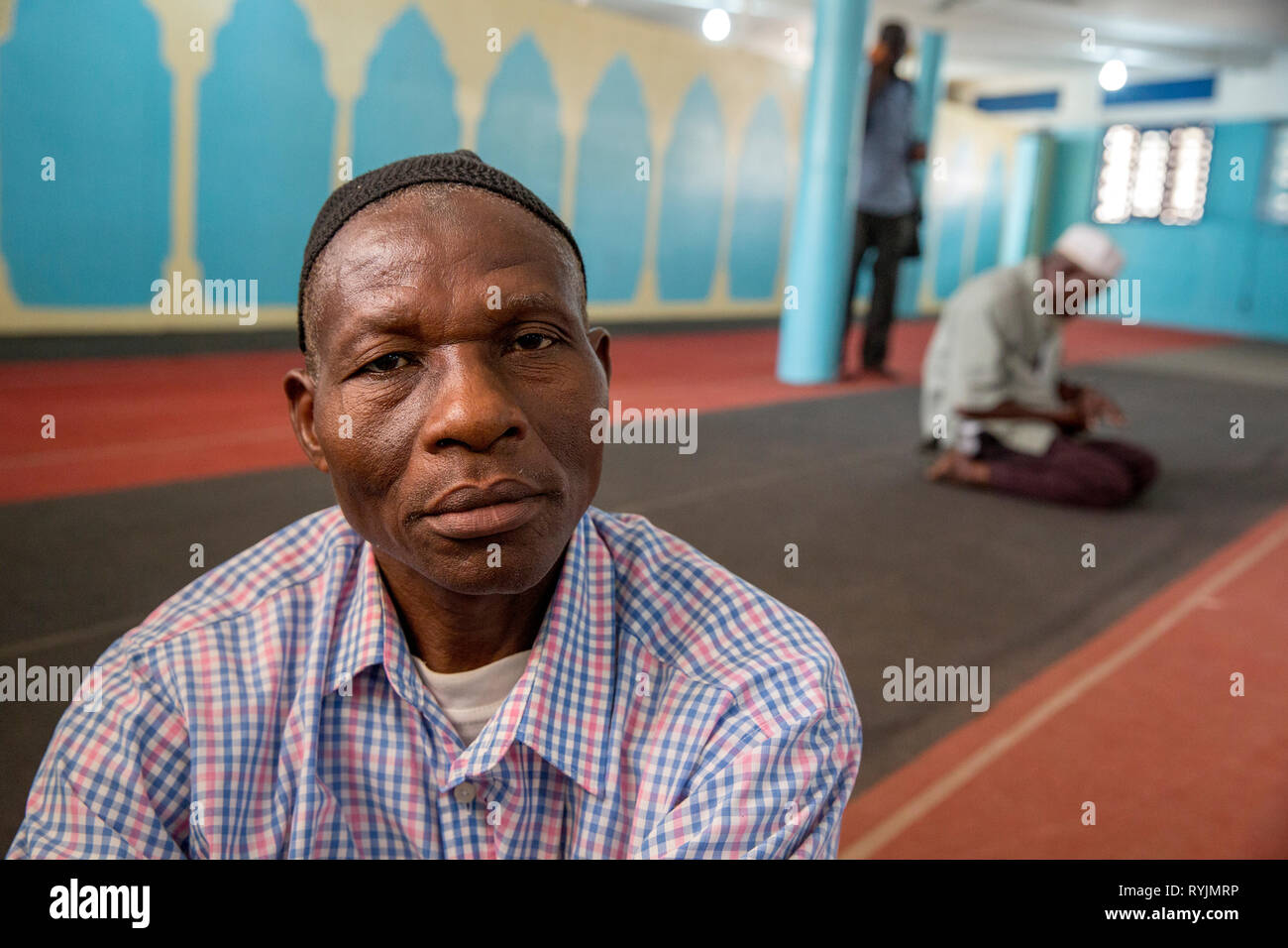 African muslims in an Abidjan mosque, Ivory Coast Stock Photo - Alamy