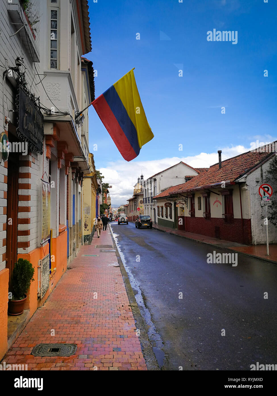 Street of la Candelaria in Bogota with colombian flag, Colombia Stock ...