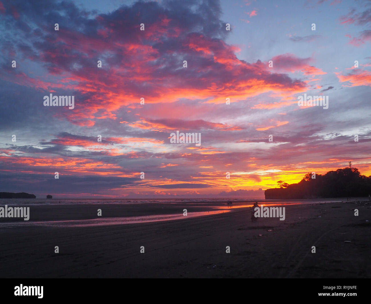 Sunset at the beach in Juanchaco, Colombia Stock Photo - Alamy