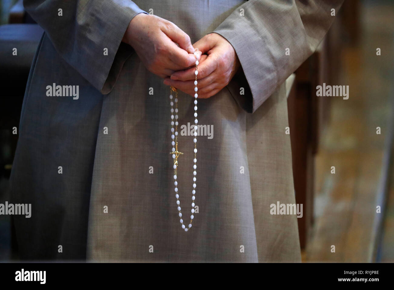 The Visitation Monastery. Visitandine nun praying the the rosary ...